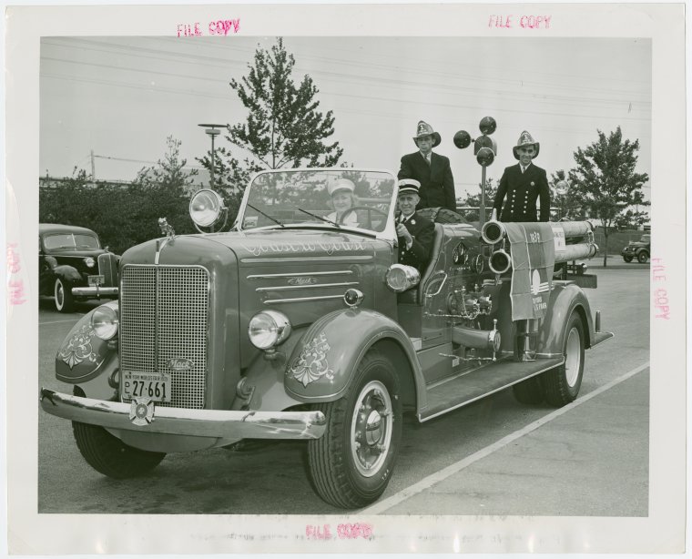 Firemen - Group on fire engine - NYPL Digital Collections