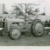 Ford - Ford, Edsel - On Ford tractor - NYPL Digital Collections