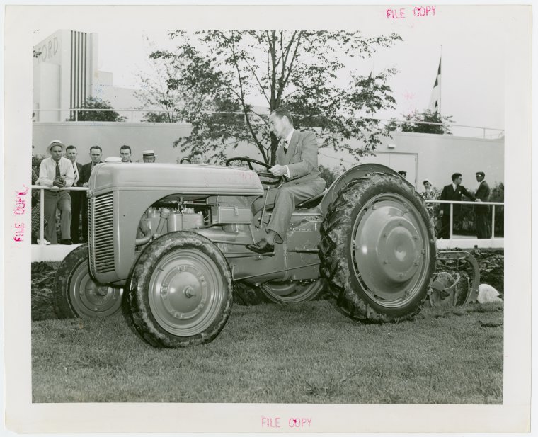 Ford - Ford, Edsel - On Ford tractor - NYPL Digital Collections