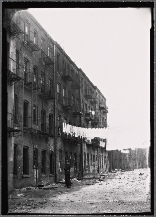 Rear of tenements with debris in yard and hanging laundry: Manhattan ...