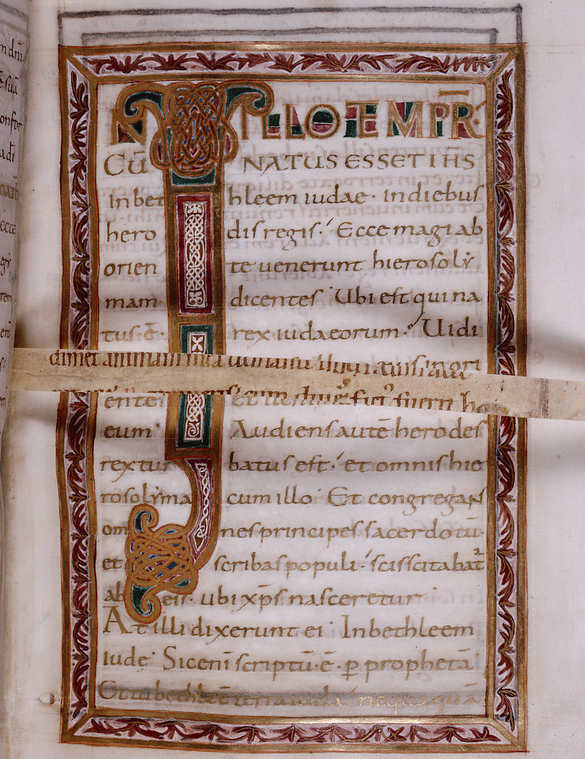 Gold capitals, uncials and Caroline in gold and purple frame, with ...