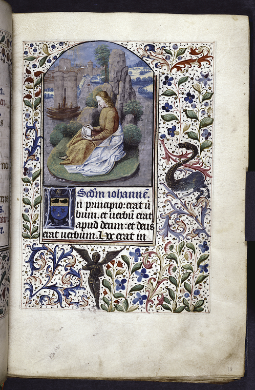 Opening of main text, with miniature of St. John the Evangelist on ...