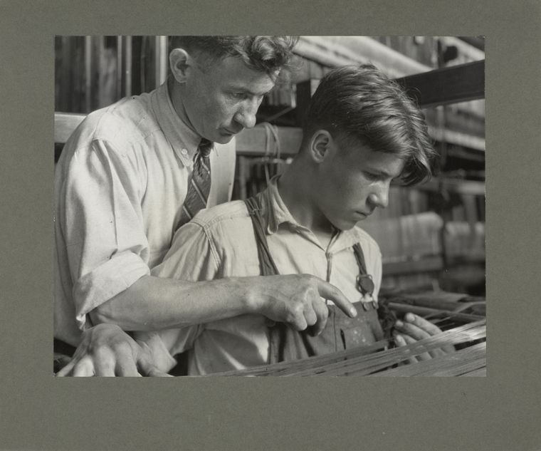 A foreman in a silk mill is teaching an apprentice..., June 1924 ...