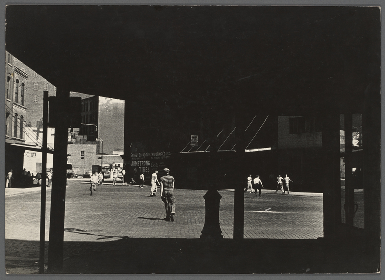 Boys playing baseball in the street - NYPL Digital Collections