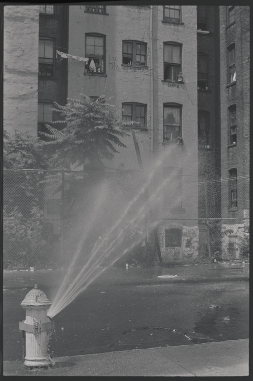 Street scene with open fire hydrant. New York, NY - NYPL Digital ...