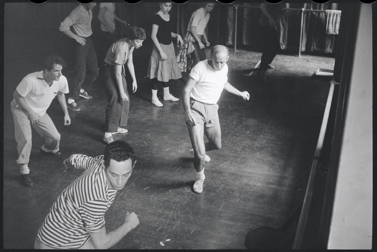 Jerome Robbins directing dancers in rehearsal for the stage production ...