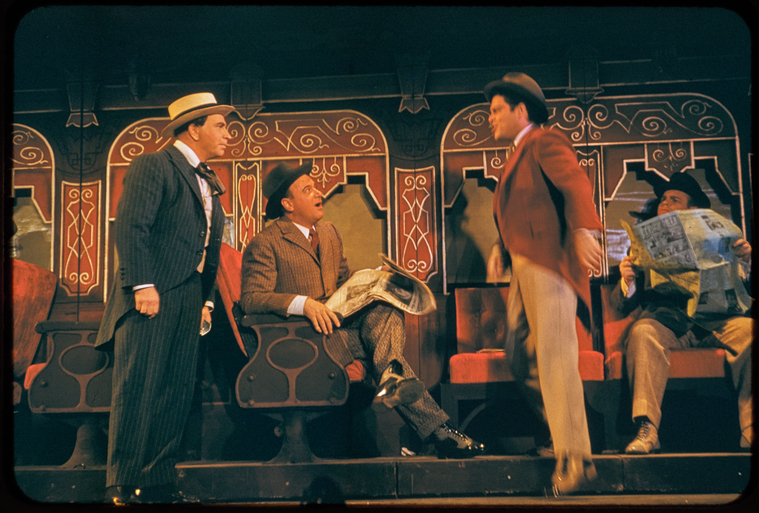 Ensemble in the stage production The Music Man - NYPL Digital Collections