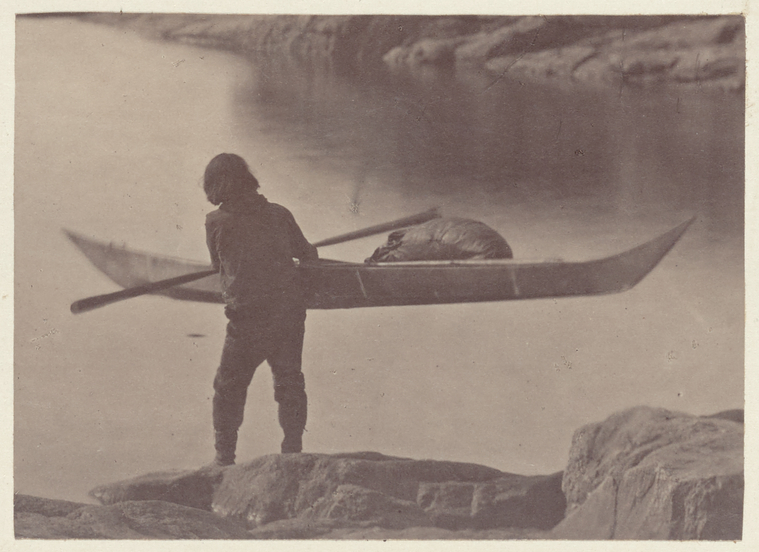 Esquimaux carrying his kayak to the water to start on hunt - NYPL ...