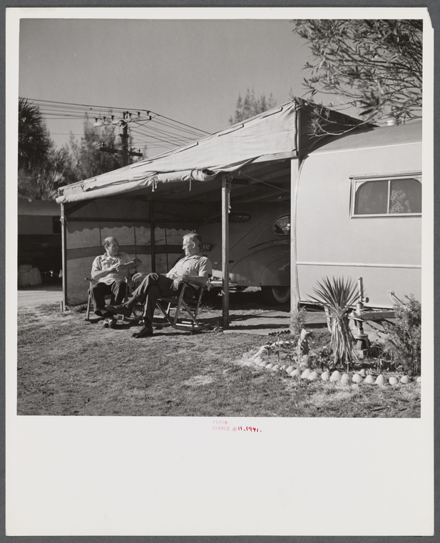 Guests at the Sarasota trailer park outside their trailer homes ...