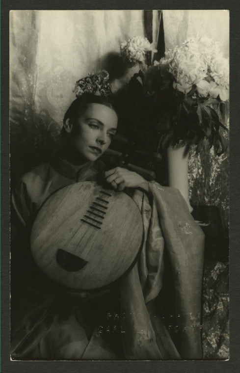 Unidentified woman holding a lute - NYPL Digital Collections