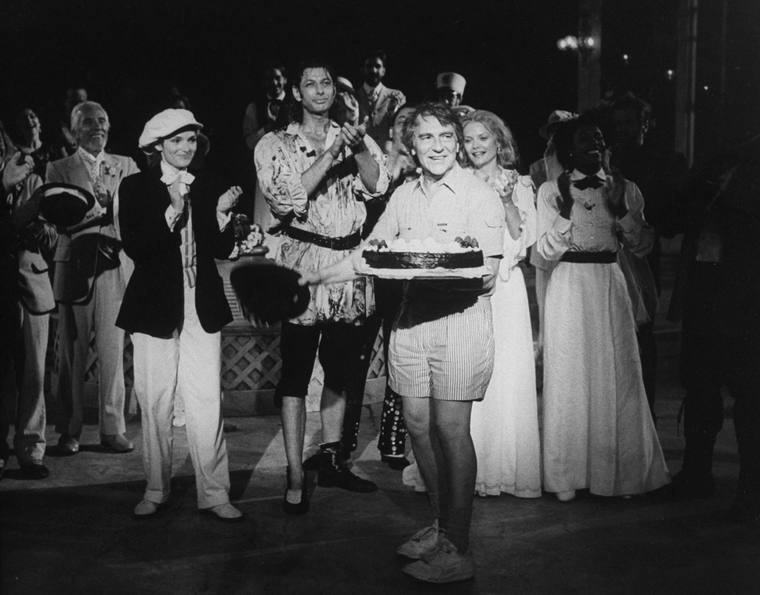 Producer Joseph Papp (C) being presented with a birthday cake by the ...