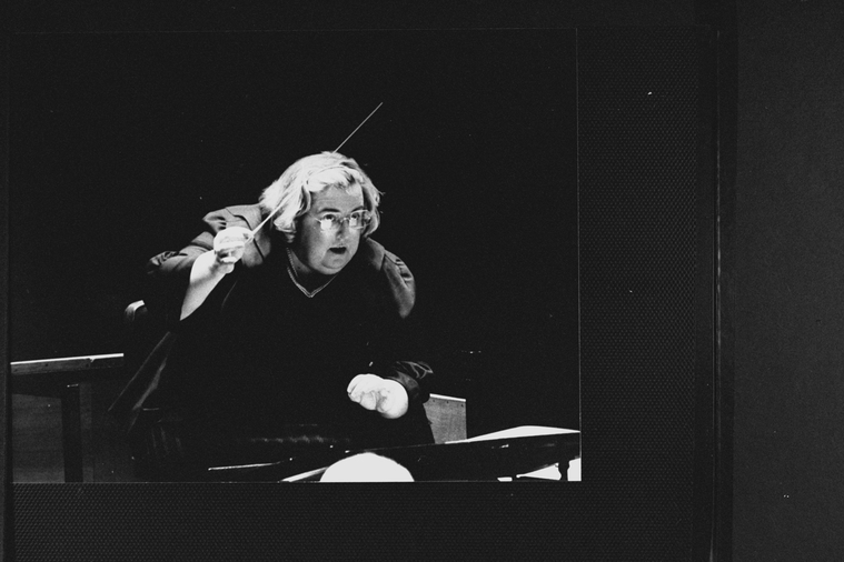 Conductor Sarah Caldwell leading the unseen NY Phiharmonic in an ...