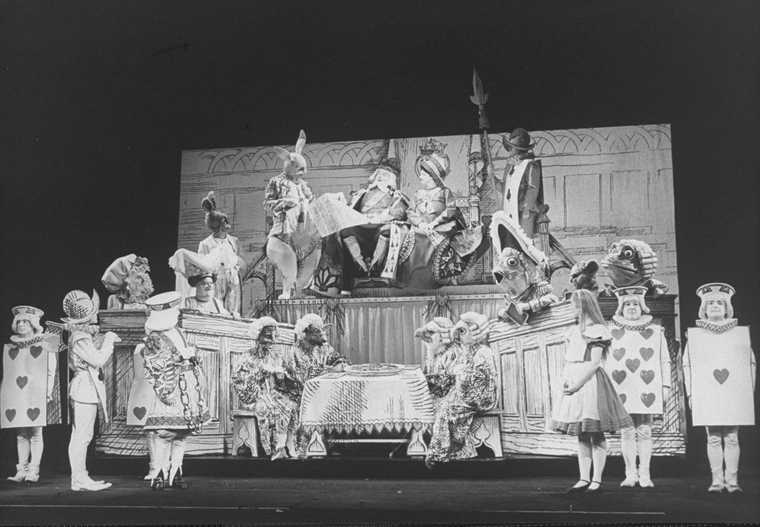 Actress Kate Burton as Alice (3L) with the much of the cast of the ...